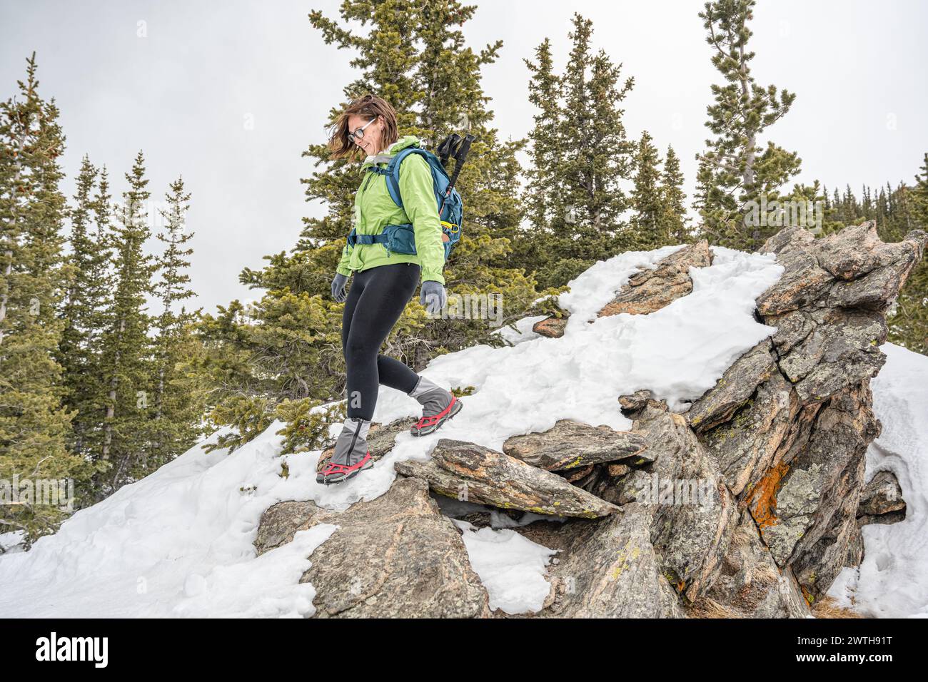 White Woman Hiking down a Colorado Mountain Stock Photo - Alamy