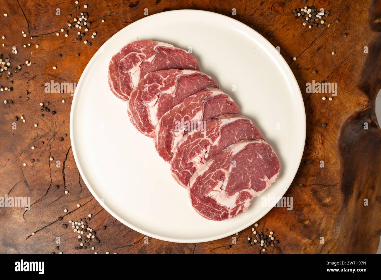 Raw beef ribeye meat. Butcher products. Fresh beef ribeye meat on dark ...