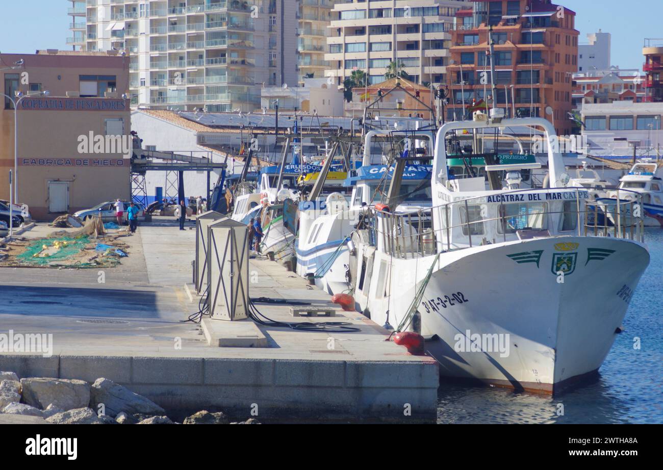 Spanish fishing boats tied up in the Mediterranean port of Calpe on the ...