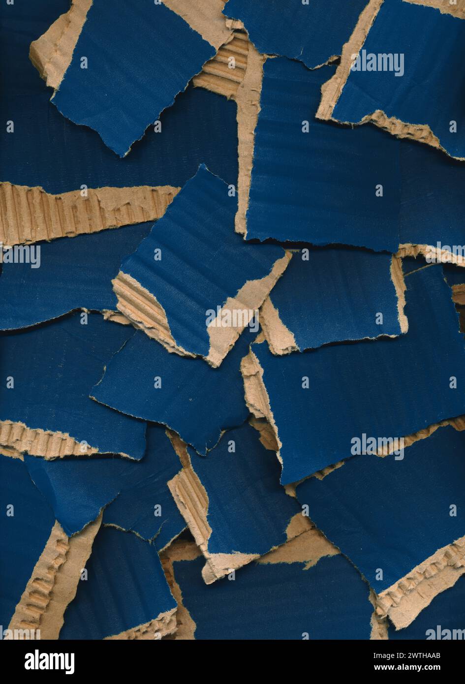 Texture from pieces of torn colored cardboard. Blue brown carton ...