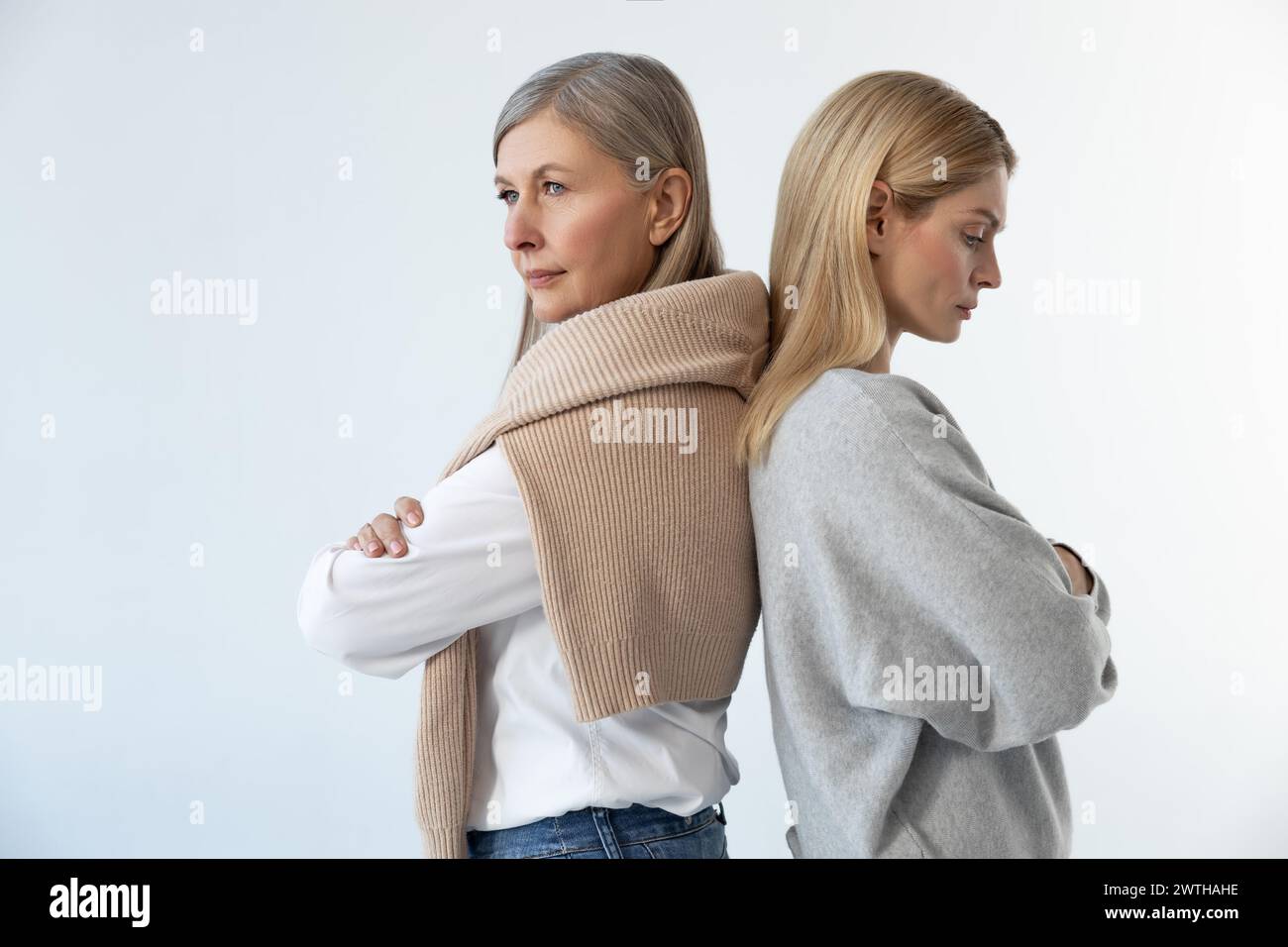 Mother daughter back to back argument hi-res stock photography and ...