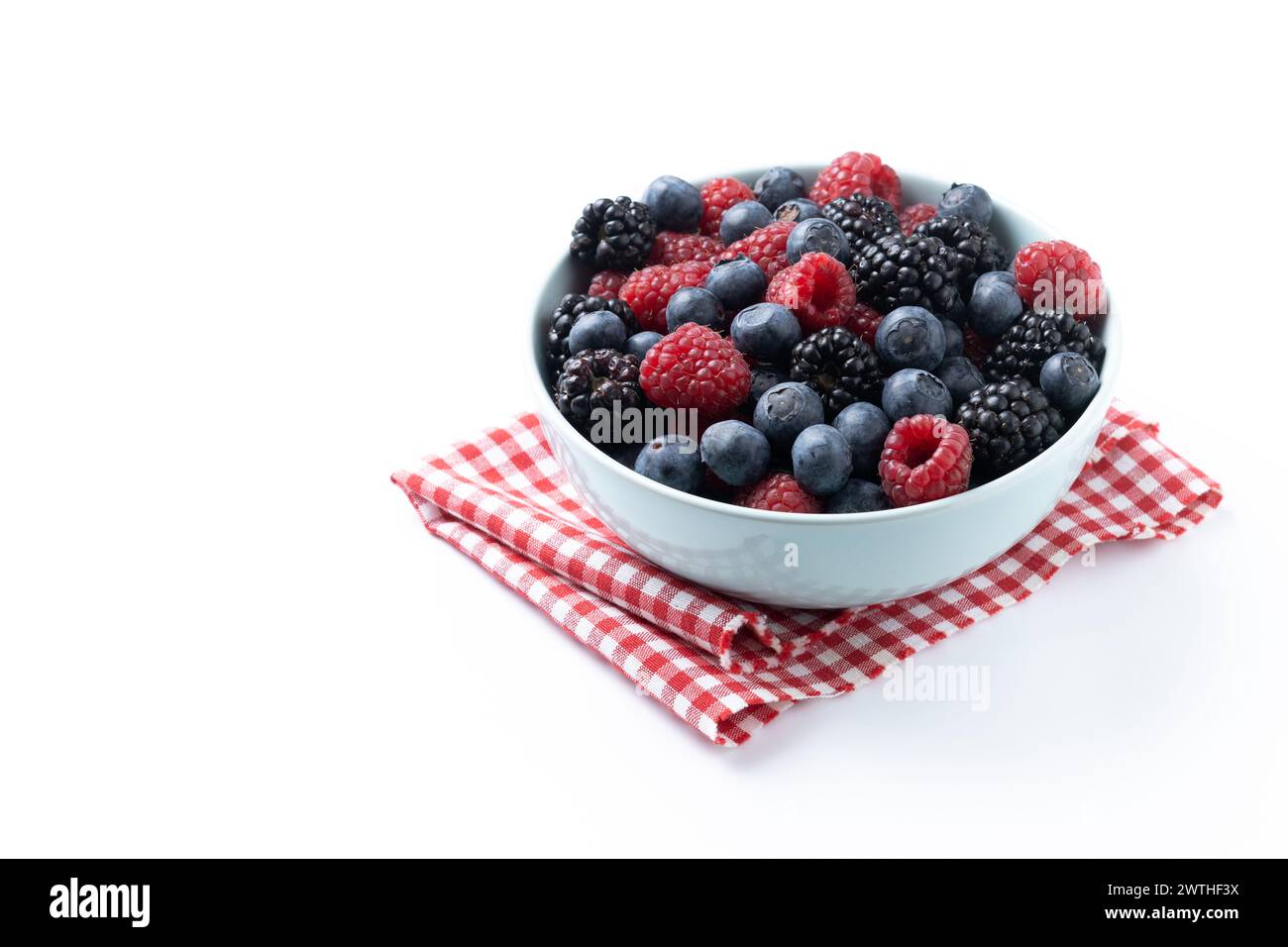 Fresh assortment berries in bowl isolated on white background Stock ...