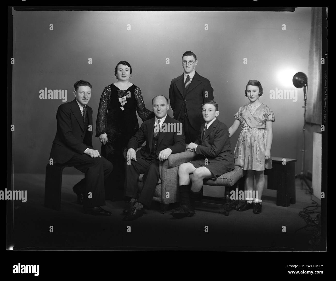 Seated in armchair Black and White Stock Photos & Images - Alamy