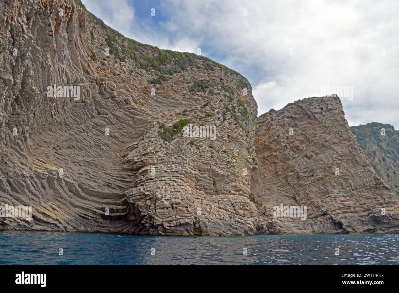 Greece, Island of Corfu, Paleokastritsa: striking folded limestone rock ...