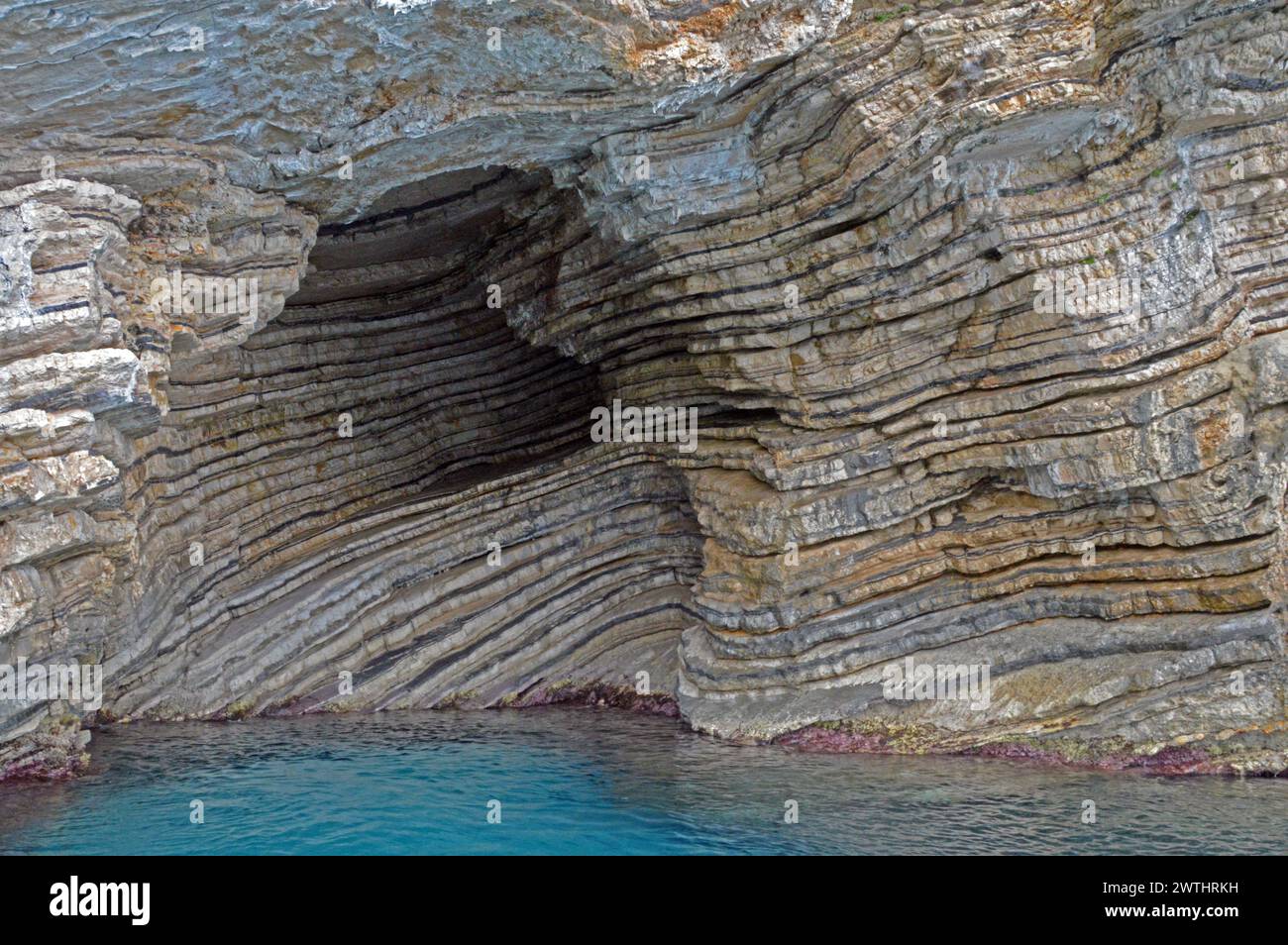Greece, Island of Corfu, Paleokastritsa: striking folded limestone rock ...