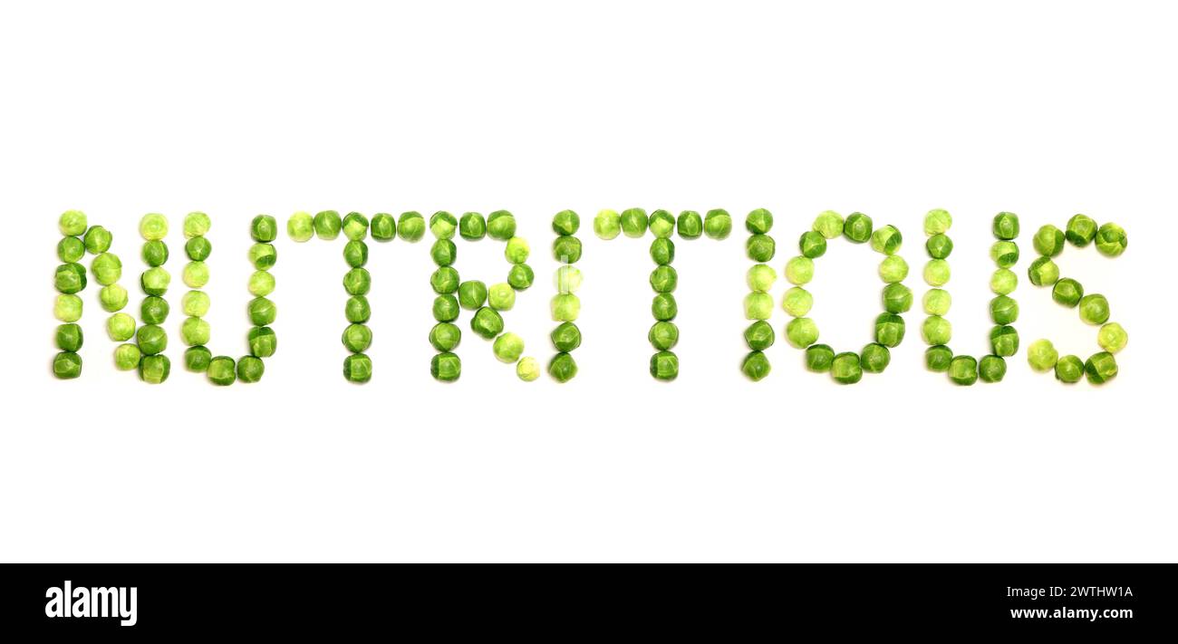 Brussel sprouts spelling the word nutritious on a plain white ...