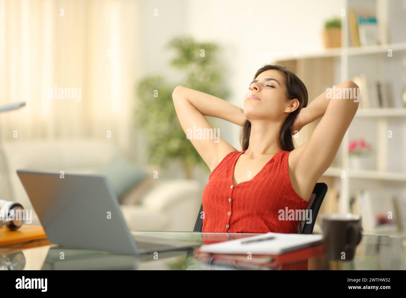 Head resting on arms hi-res stock photography and images - Alamy