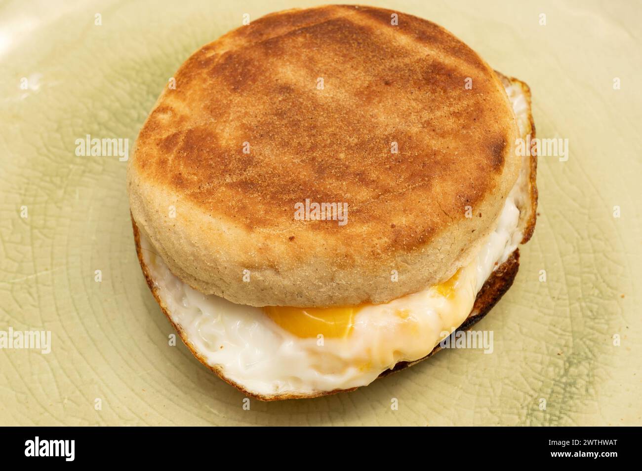Fried egg and toasted muffin Stock Photo - Alamy