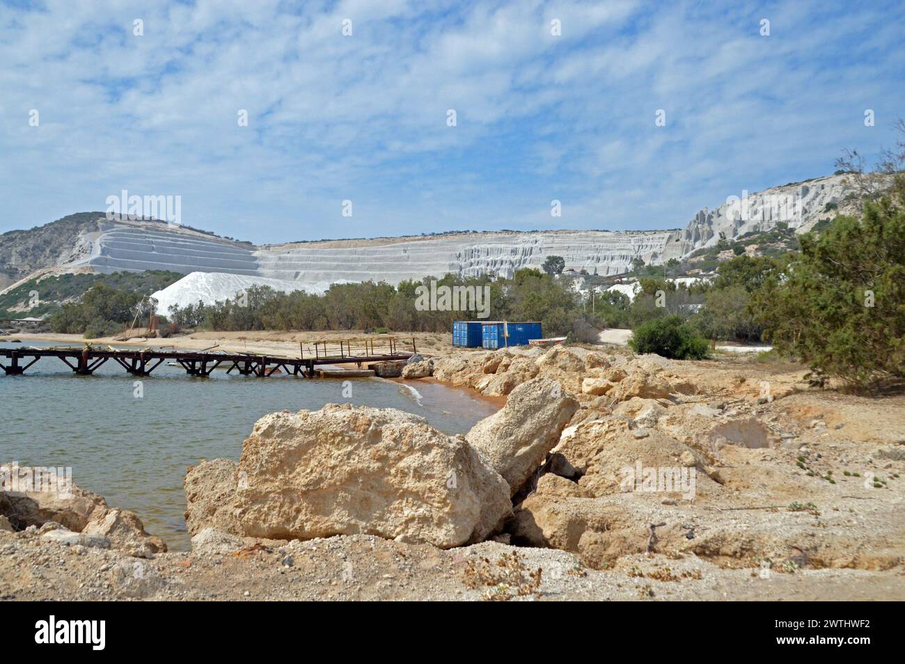 Greece, Island of Yali: view of the terraced pumice quarry, with mounds ...