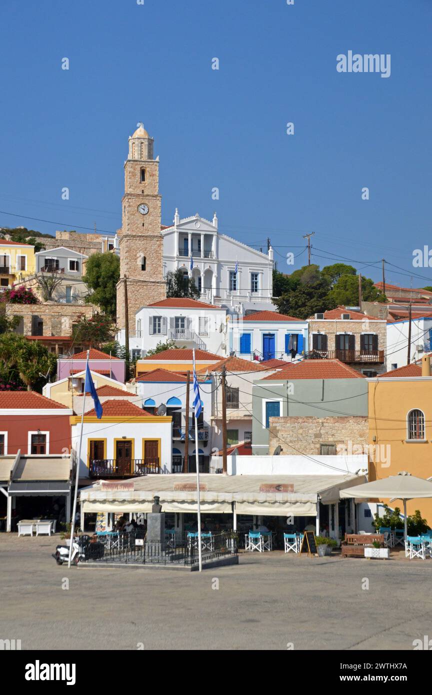 Greece, Island of Chalki: the promenade and waterfront, with house ...