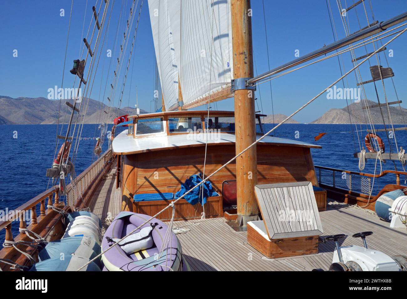 Greece, Island of Symi: the Turkish sailing boat "Bahriyeli C" leaving ...