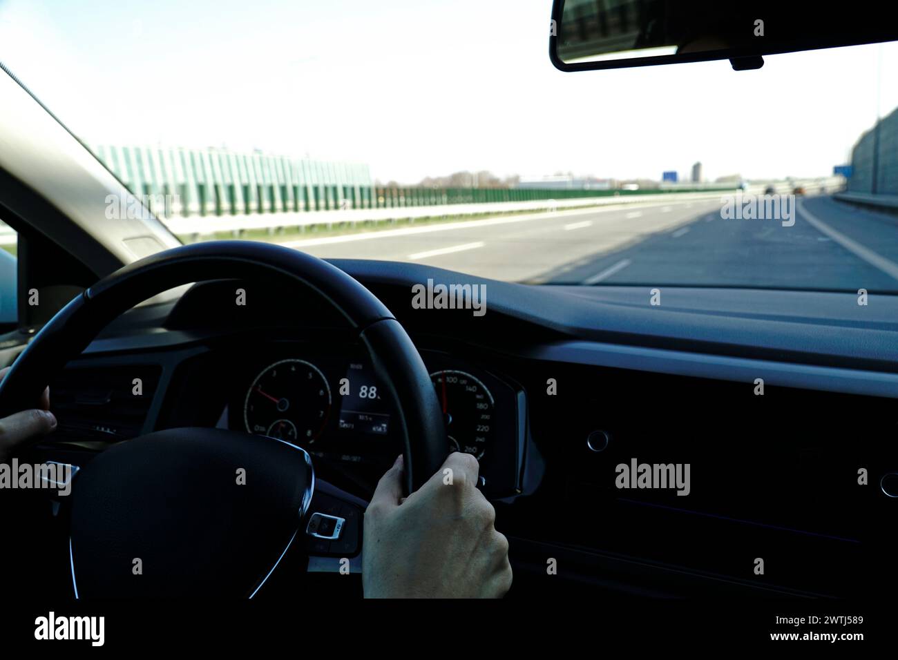 Driving a car on a highway Stock Photo - Alamy