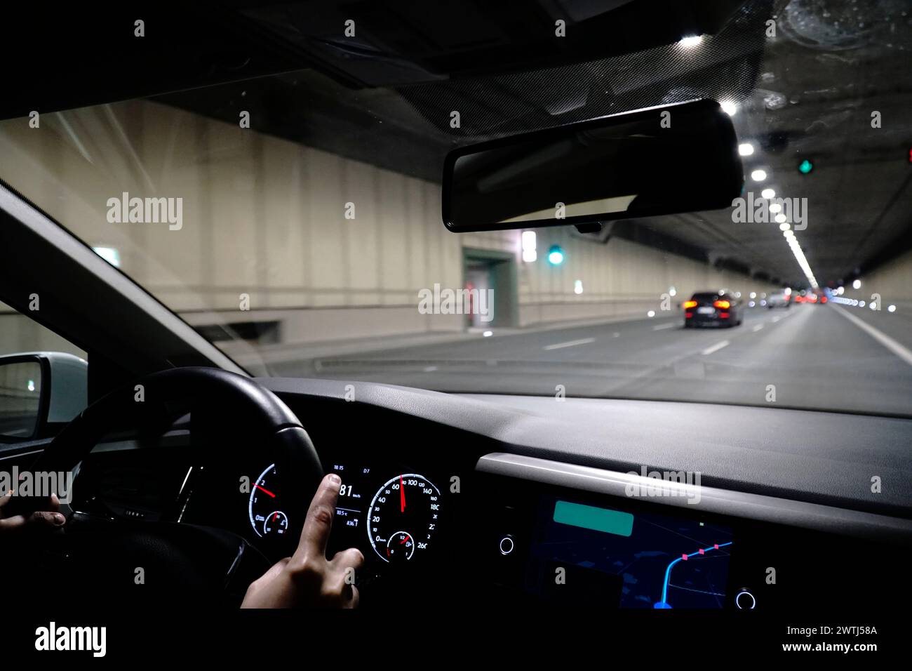The interior of a car driving in a tunnel hi-res stock photography and ...