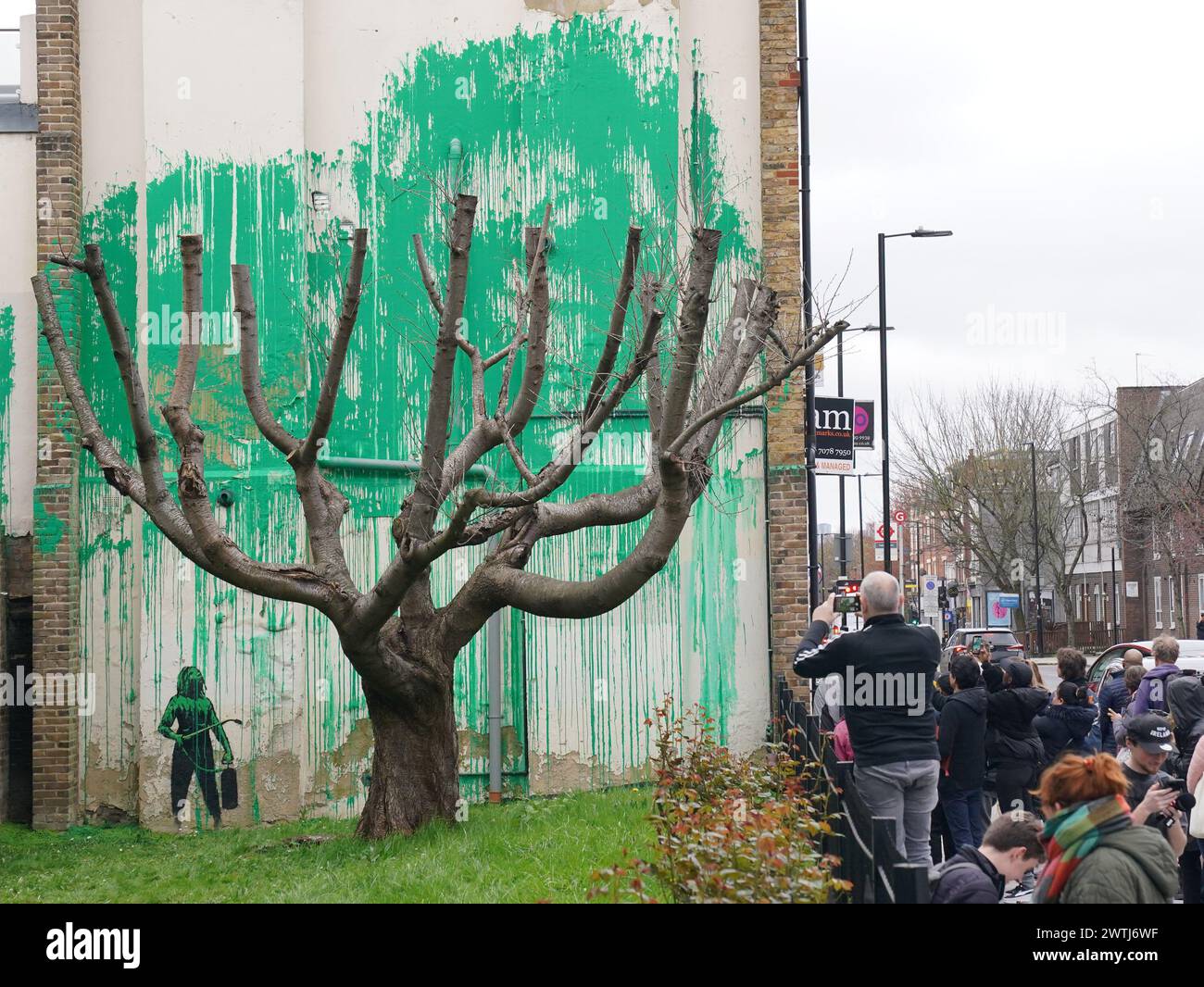 Banksy tree mural hi-res stock photography and images - Alamy