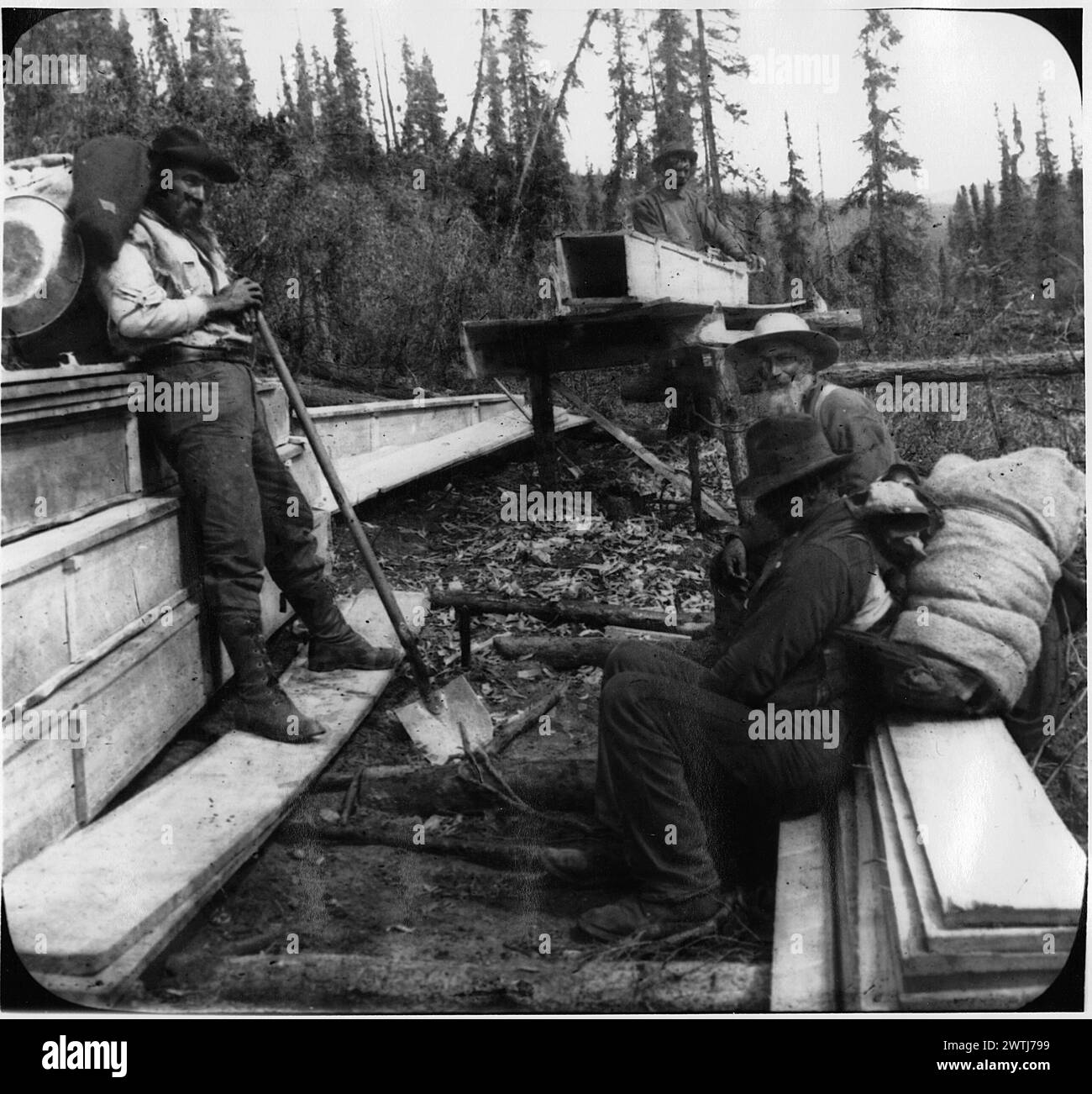 Transparency - Making sluice boxes, new claim, Hunker's Creek, YT, 1898 ...