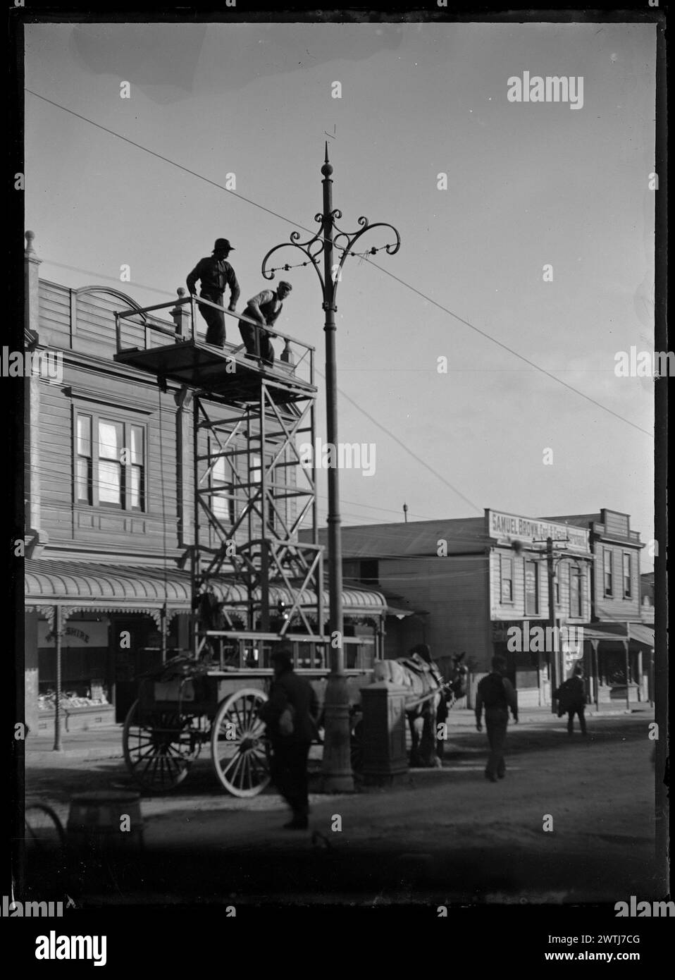 Installing overhead tram wires black-and-white negatives Stock Photo ...