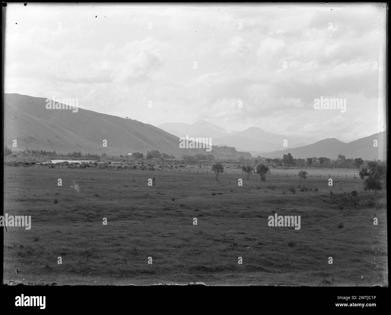 View down Motueka valley to peaks of Mt Arthur Range; the peak of Mt ...