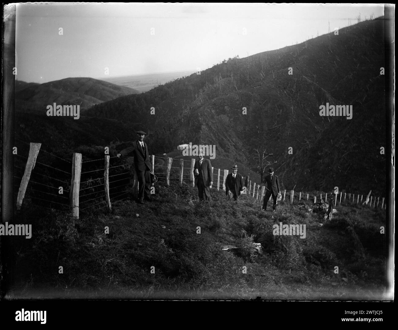 Our party ascending the spur leading from Mangatangi Gully to the crest ...