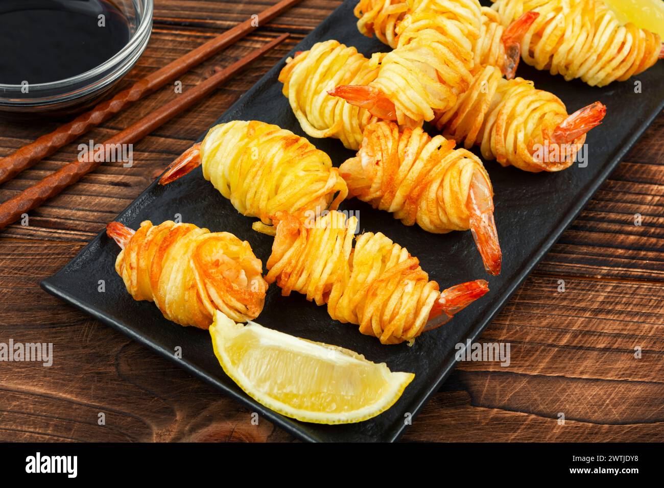 Fried rolled potato shrimps, prawns and potato rolls. Popular Asian ...