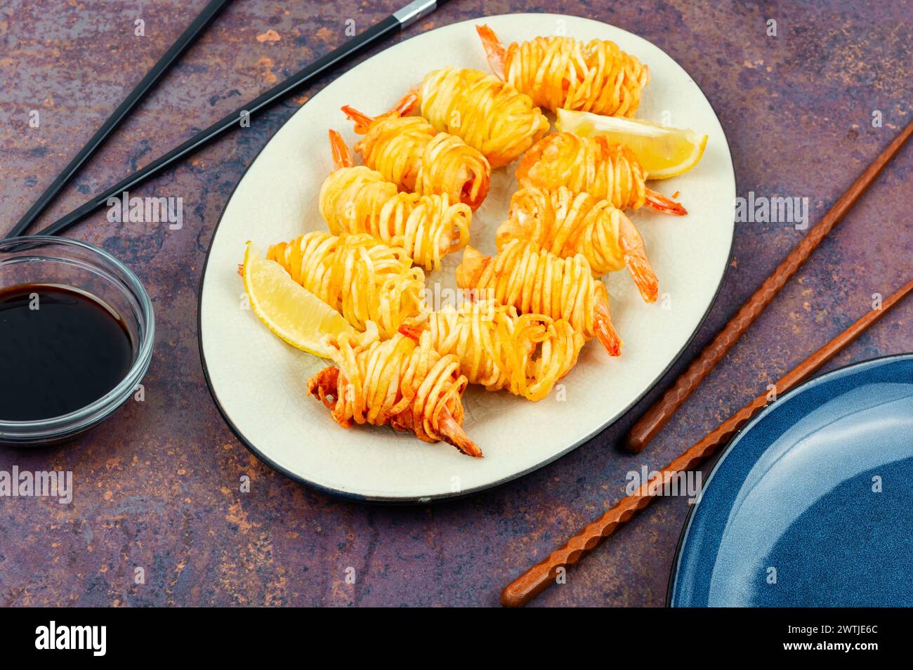 Fried rolled potato shrimps, prawns and potato rolls. Popular Asian ...