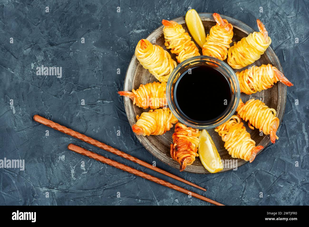 Fried rolled potato shrimps, prawns and potato rolls. Popular Asian ...