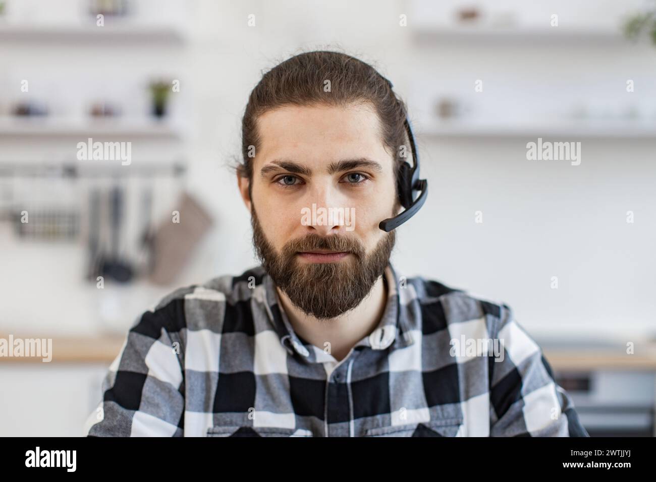 Happy professional working virtually as staff member for fully remote ...
