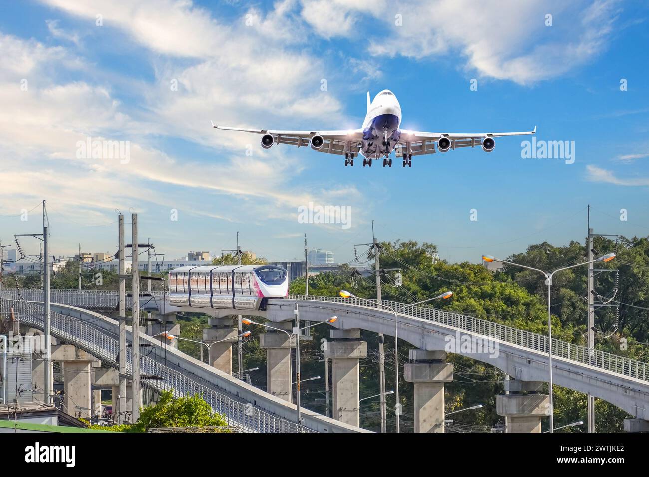 View railway track and suburban electric monorail train rushing to the ...