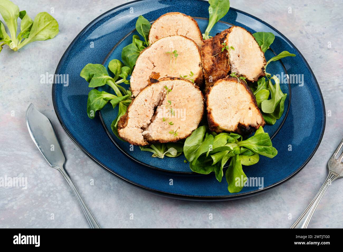 Roasted cod roe on a plate. Seafood and fish dishes Stock Photo - Alamy