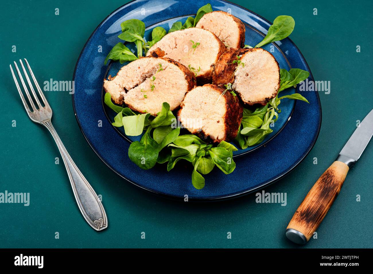 Roasted cod roe on a plate. Seafood and fish dishes Stock Photo - Alamy