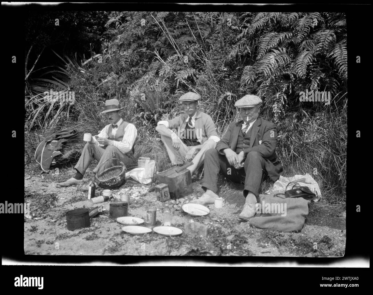 Three men picnicking gelatin silver negatives, black-and-white ...