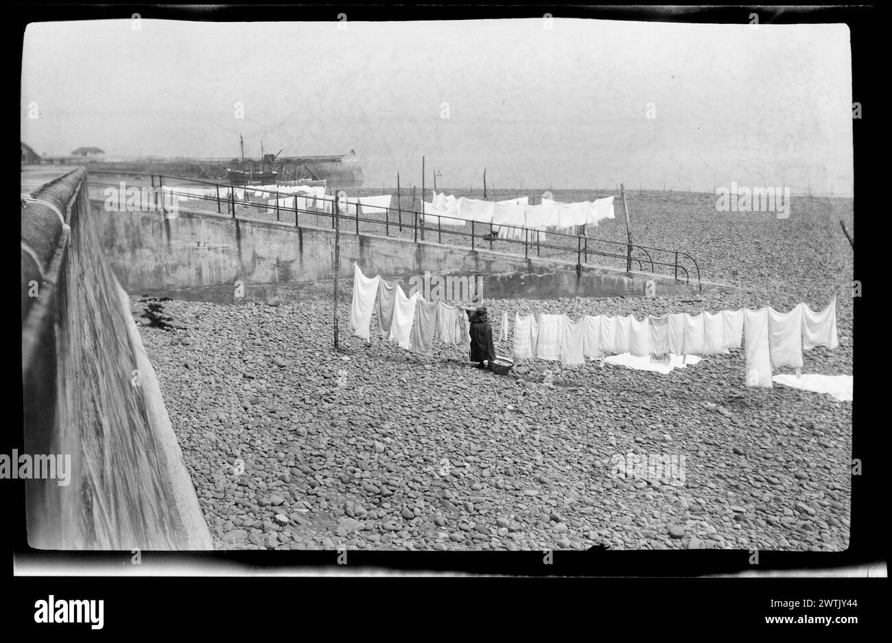 Washing line on the beachfront gelatin silver negatives, black-and ...