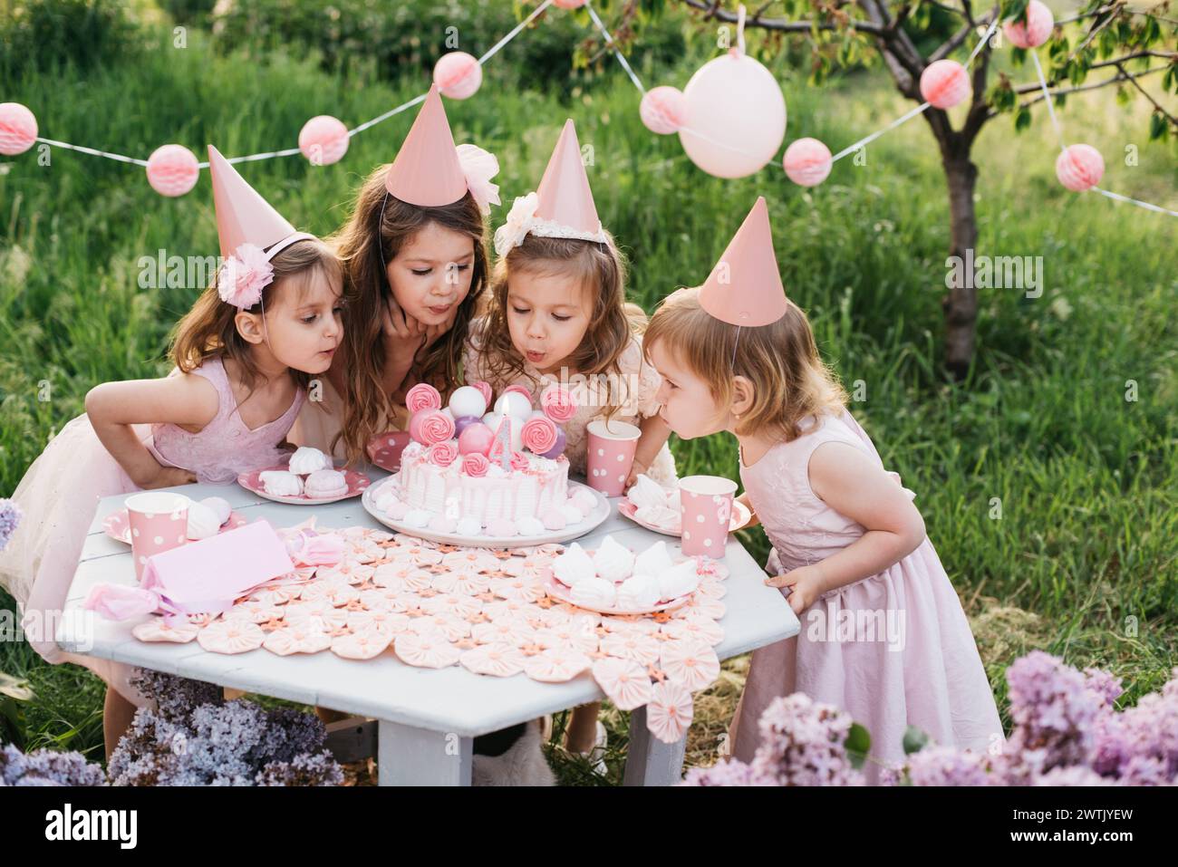 Summer outdoor kids birthday party. Group of happy Children celebrating ...