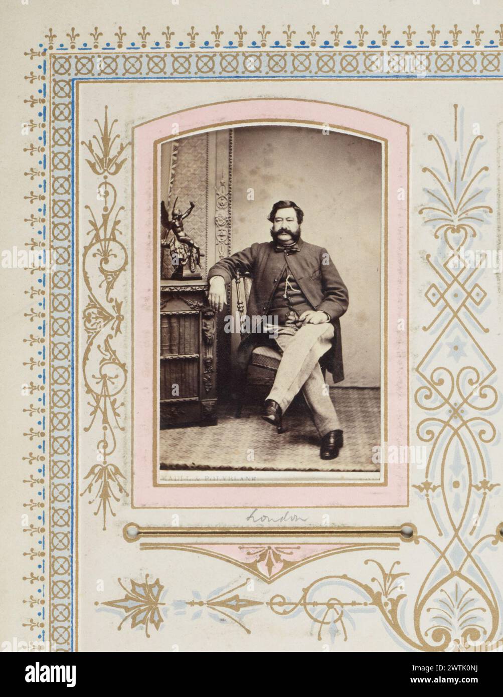 Man sitting on chair cross-legged. From the album: The Colonial Family ...