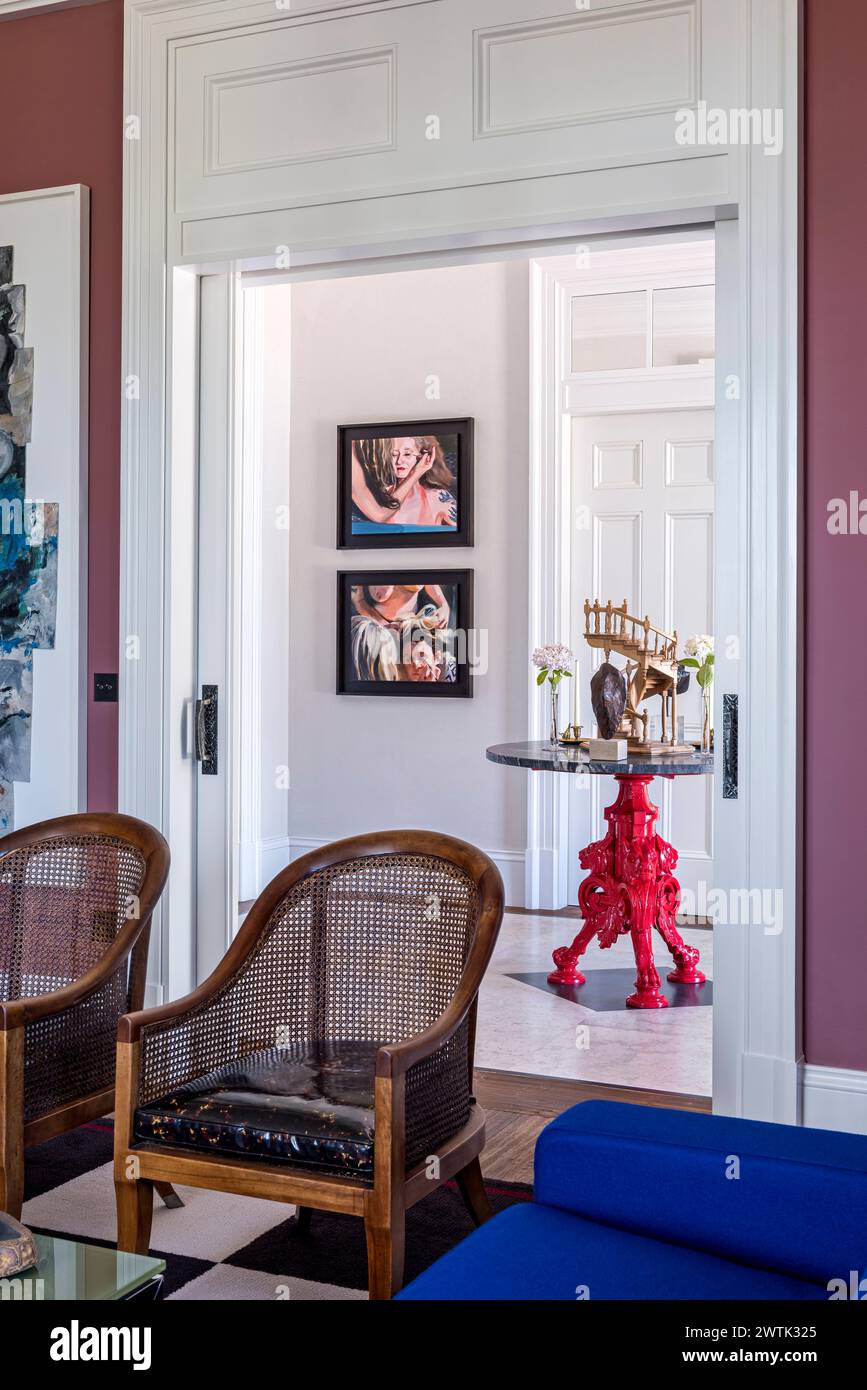 View through double sliding door to unusual three-legged table in Irish ...