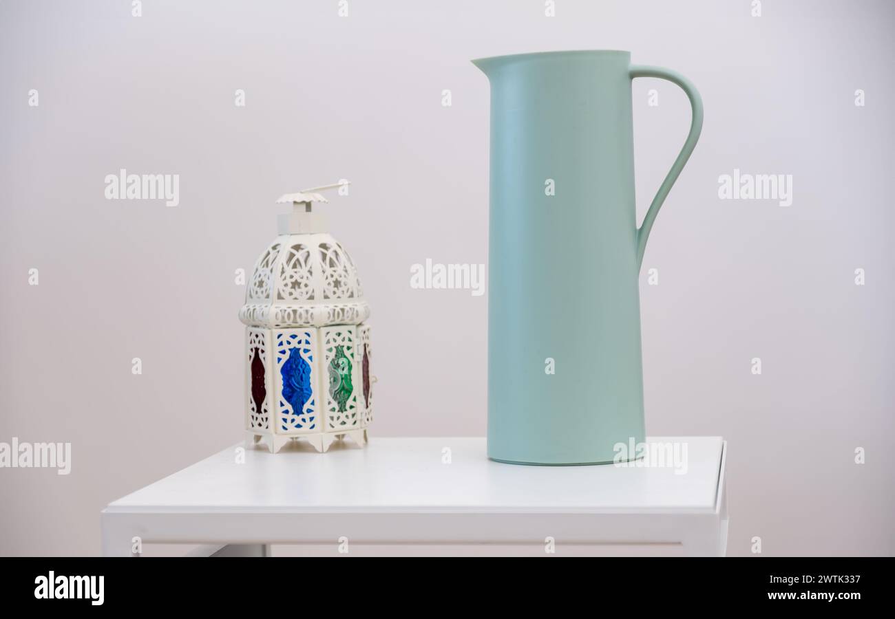 Arabic coffee pot with islamic fanos on white background Stock Photo ...
