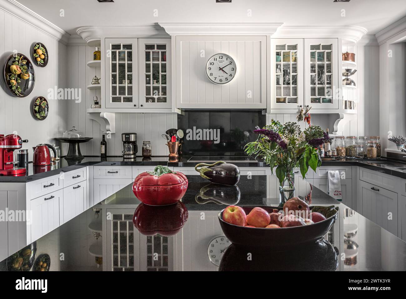 Modern white fitted kitchen with island unit in Irish home, Greystones ...