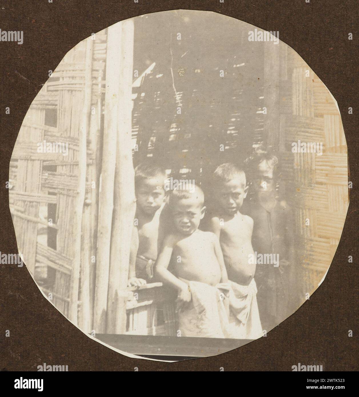 Four Samoan boys. From the album: Samoa gelatin silver prints, black ...
