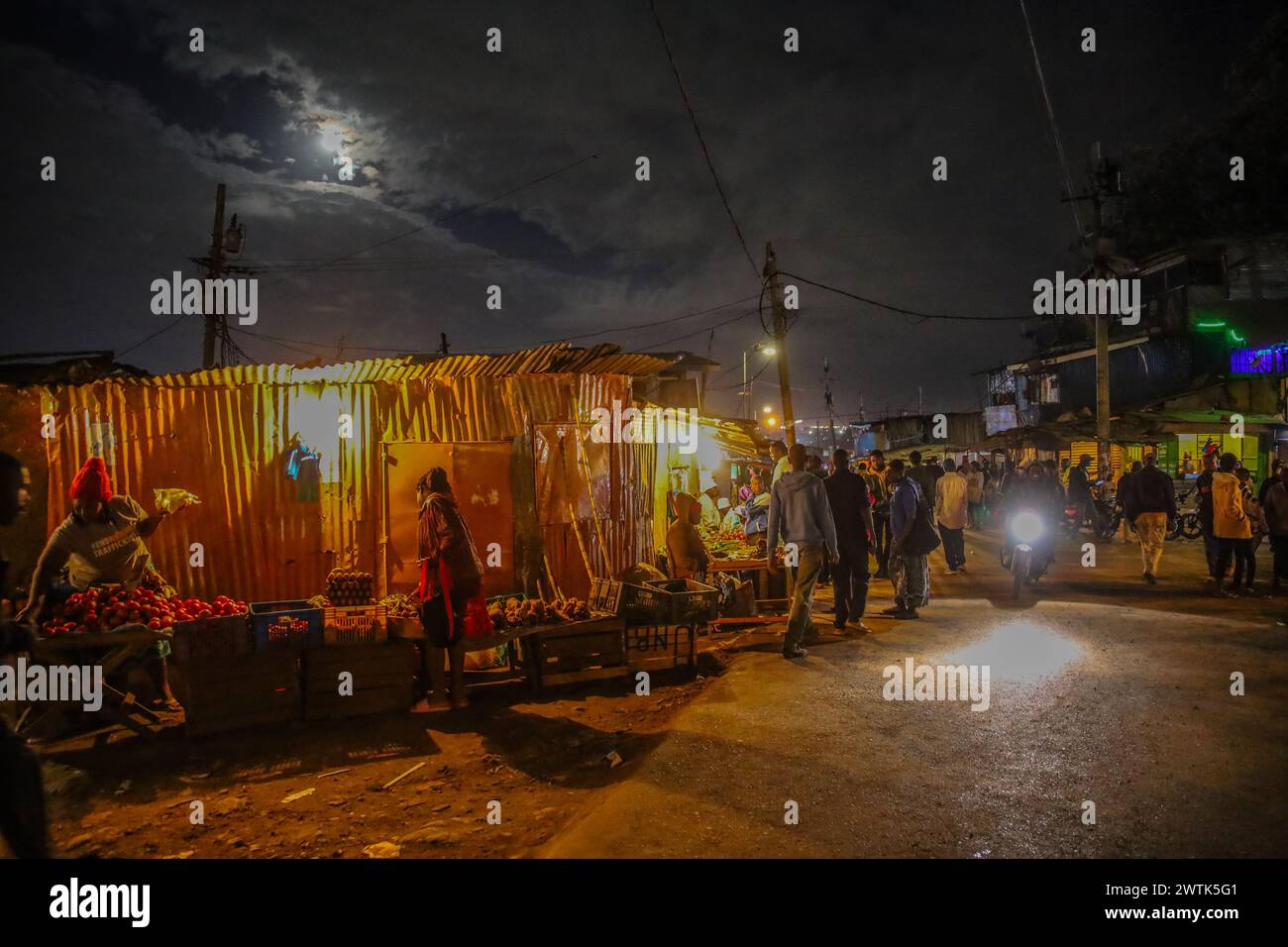 Residents walk back home from work late in the evening through the ...