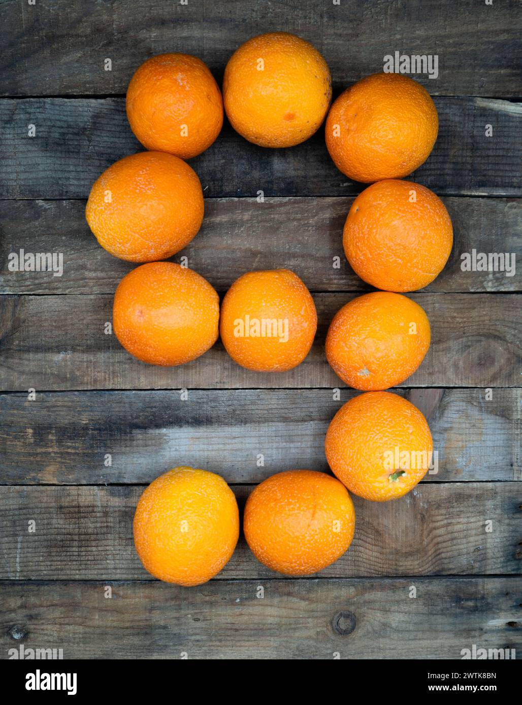 Oranges placed in the shape of a 9 Stock Photo - Alamy