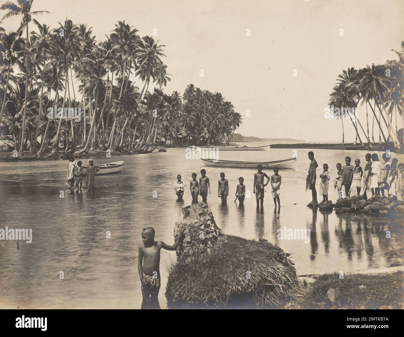 Children standing in a bay. From the album: Photographs of Apia, Samoa ...