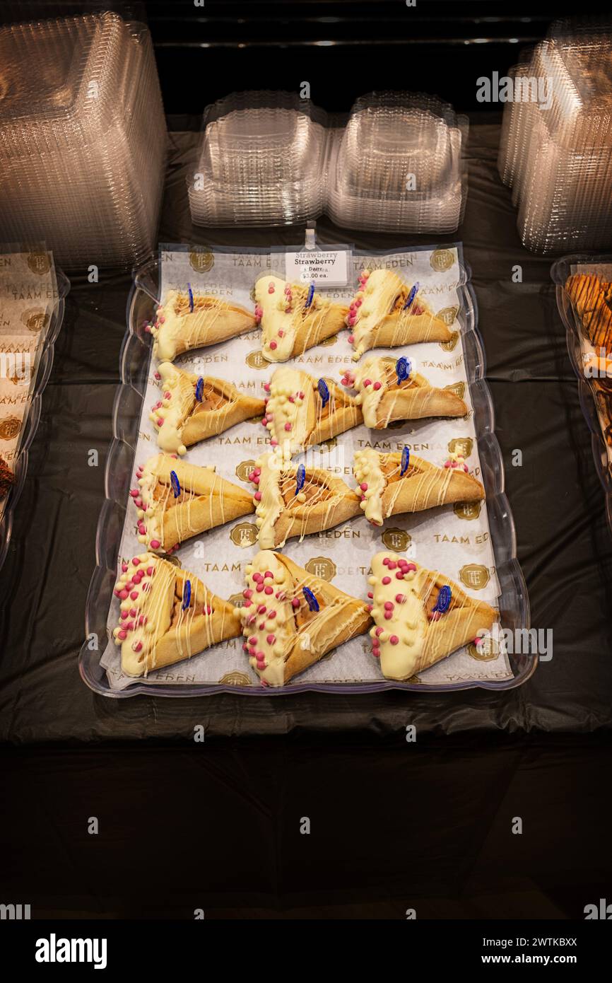 A plate of strawberry hummentaschen for sale at the Foodoo Kosher ...