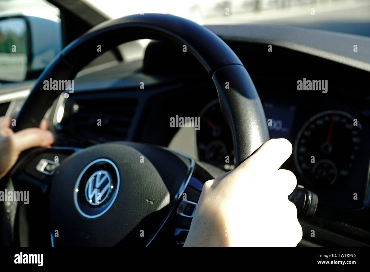 Majdan, Poland - March 10th, 2024 - Driving Volkswagen car - hands on ...