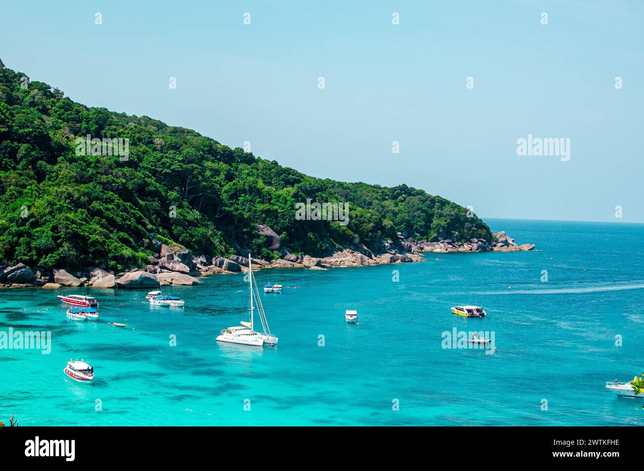 Tropical islands of ocean blue sea water and white sand beach at Similan Islands with famous ...