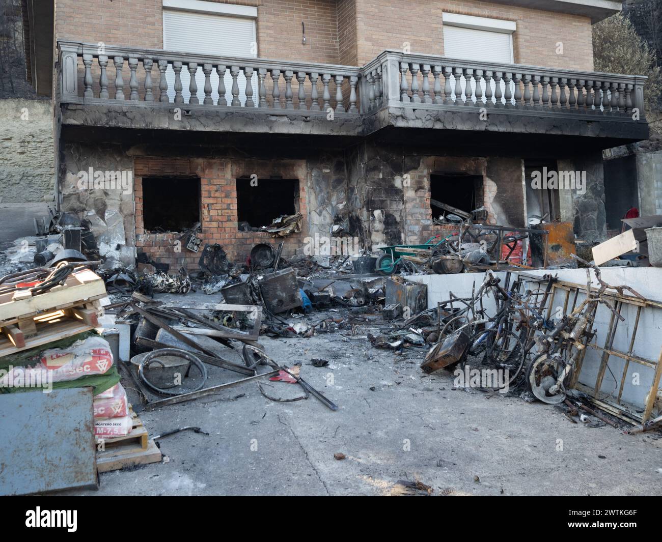 Detail of charred and burned personal objects after a house fire Stock ...