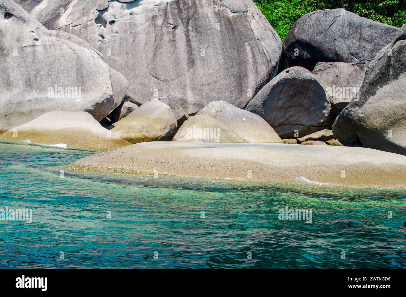Rocks and stone beach Similan Islands with famous Sail Rock, Phang Nga ...