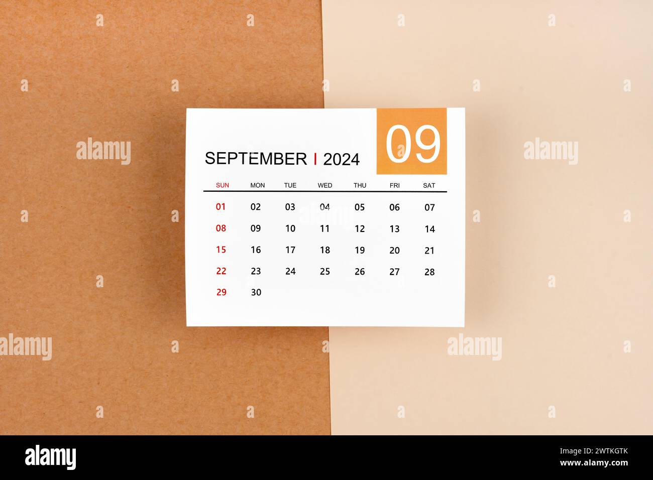 A September 2024 calendar page on yellow background Stock Photo - Alamy
