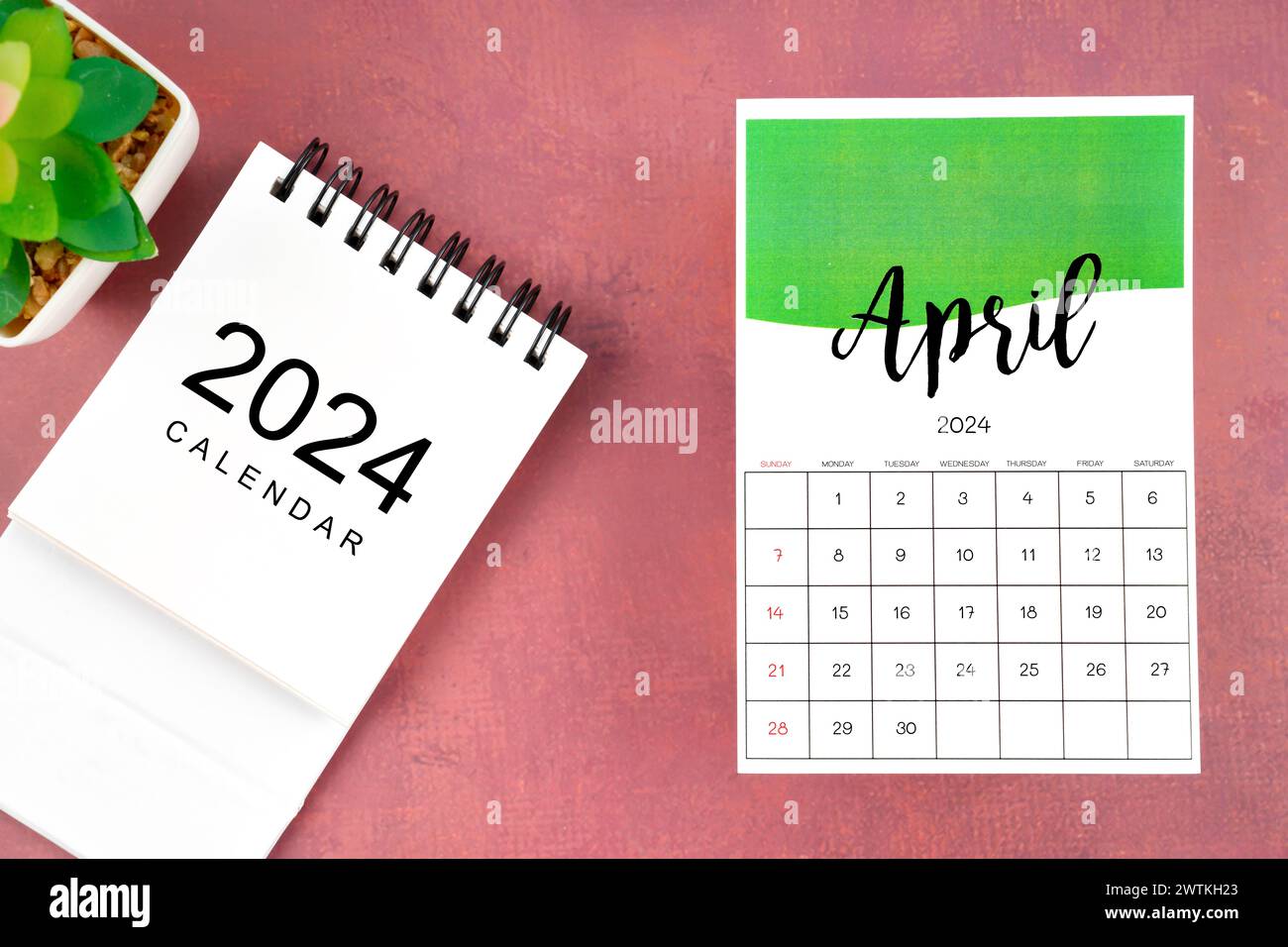 April 2024 calendar page with plant pot on red background Stock Photo ...