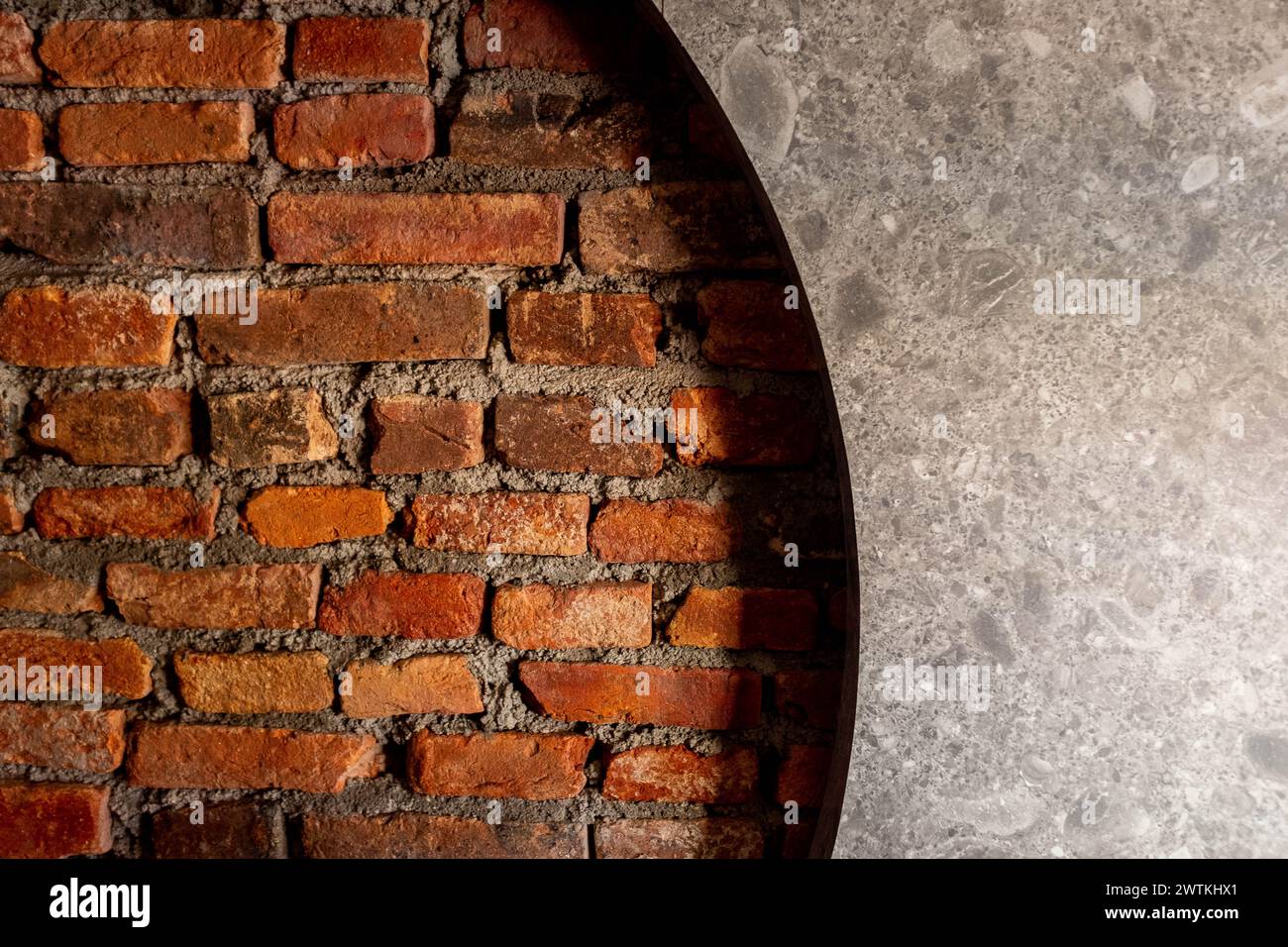 An open red brick wall with textured paint Stock Photo - Alamy