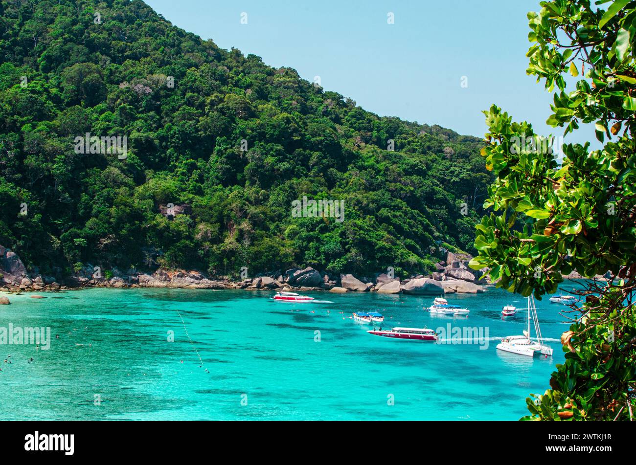 Tropical islands of ocean blue sea water and white sand beach at ...