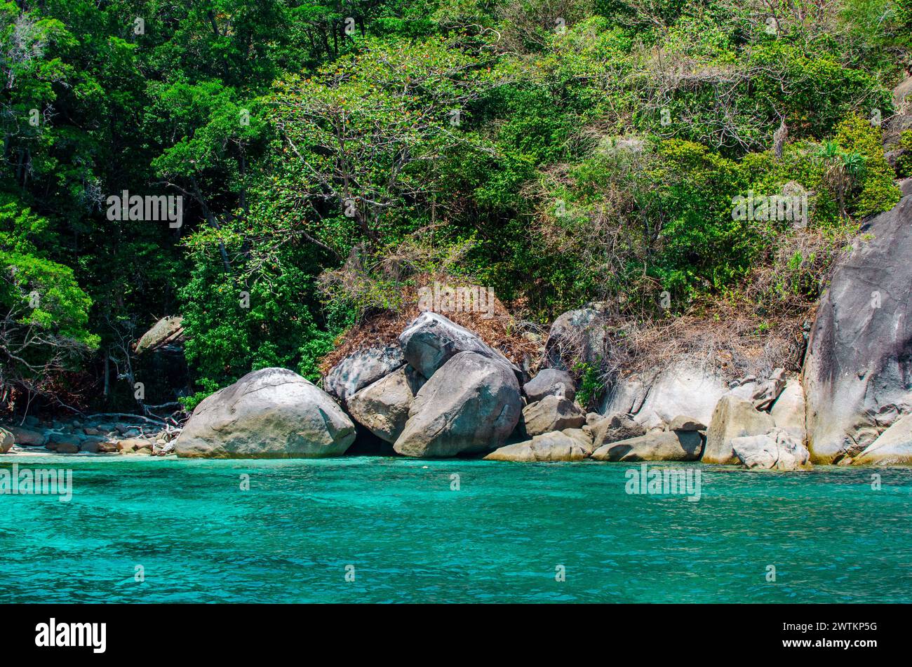 Rocks and stone beach Similan Islands with famous Sail Rock, Phang Nga ...
